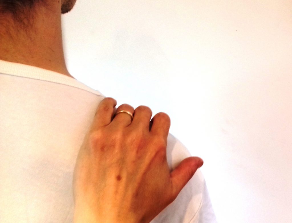 hand on shoulder - Simple Ayurveda